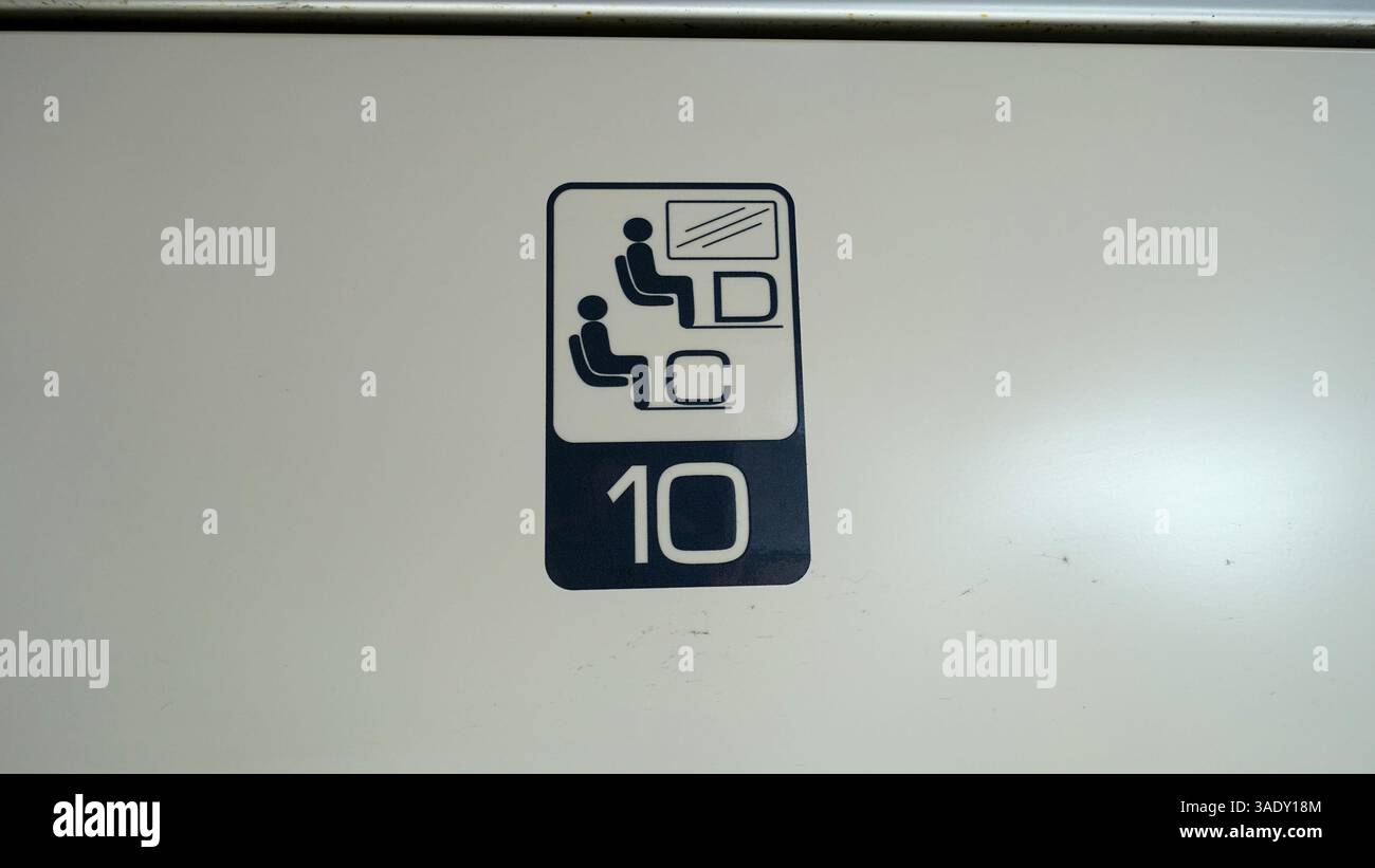 Black and white indications for the numbered seat in a train ...