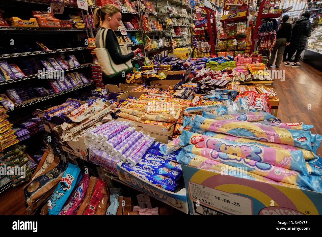 Candies from around the world are displayed for sale at Economy Candy ...