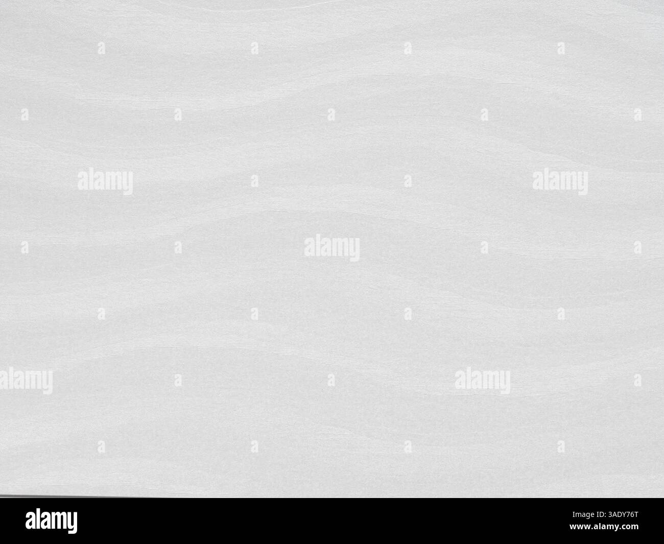 Subtle white waves on a textured paper surface with an organic flow ...