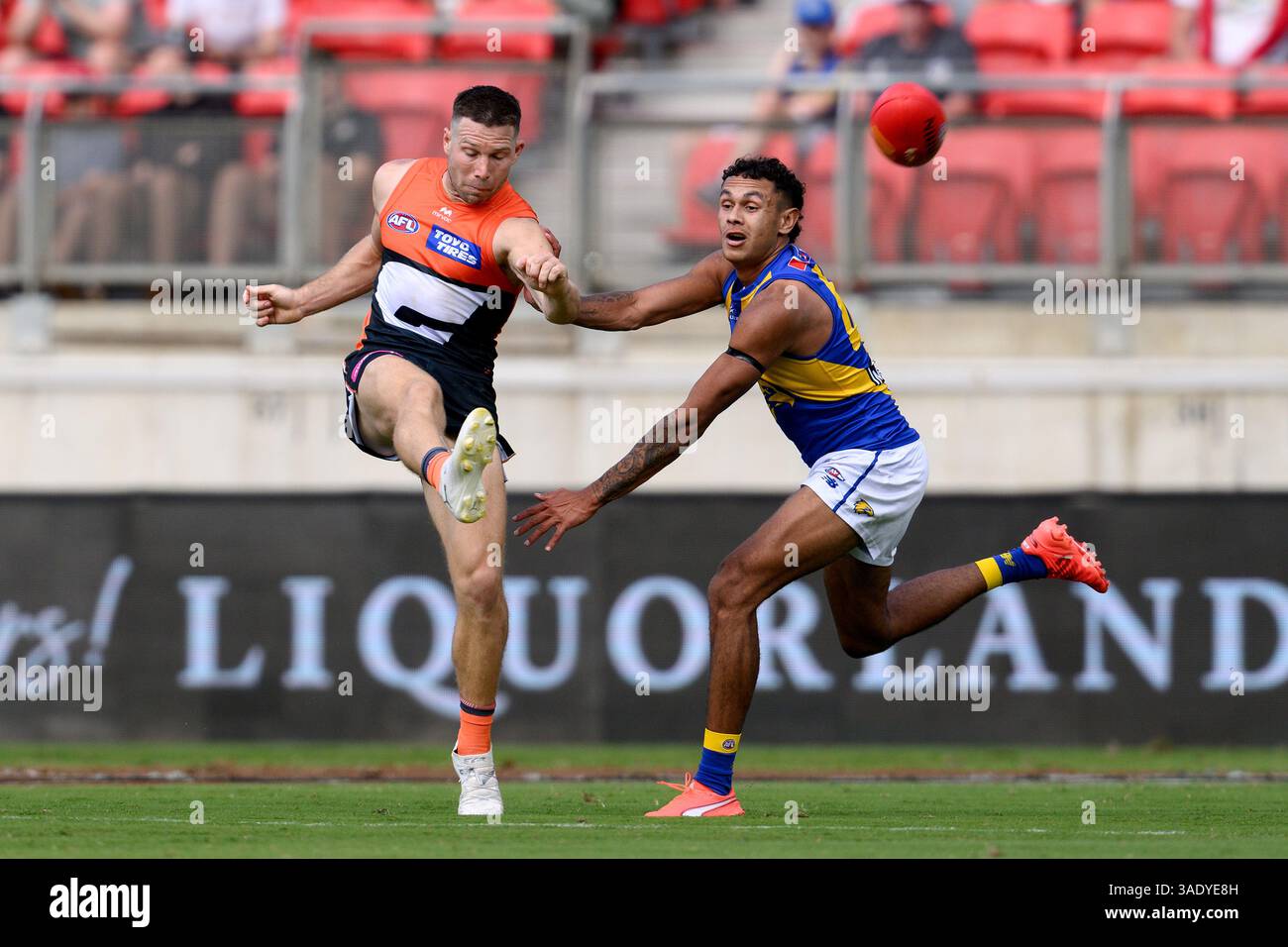 Toby Greene of the GWS Giants kicks the ball during the AFL Round 4 ...