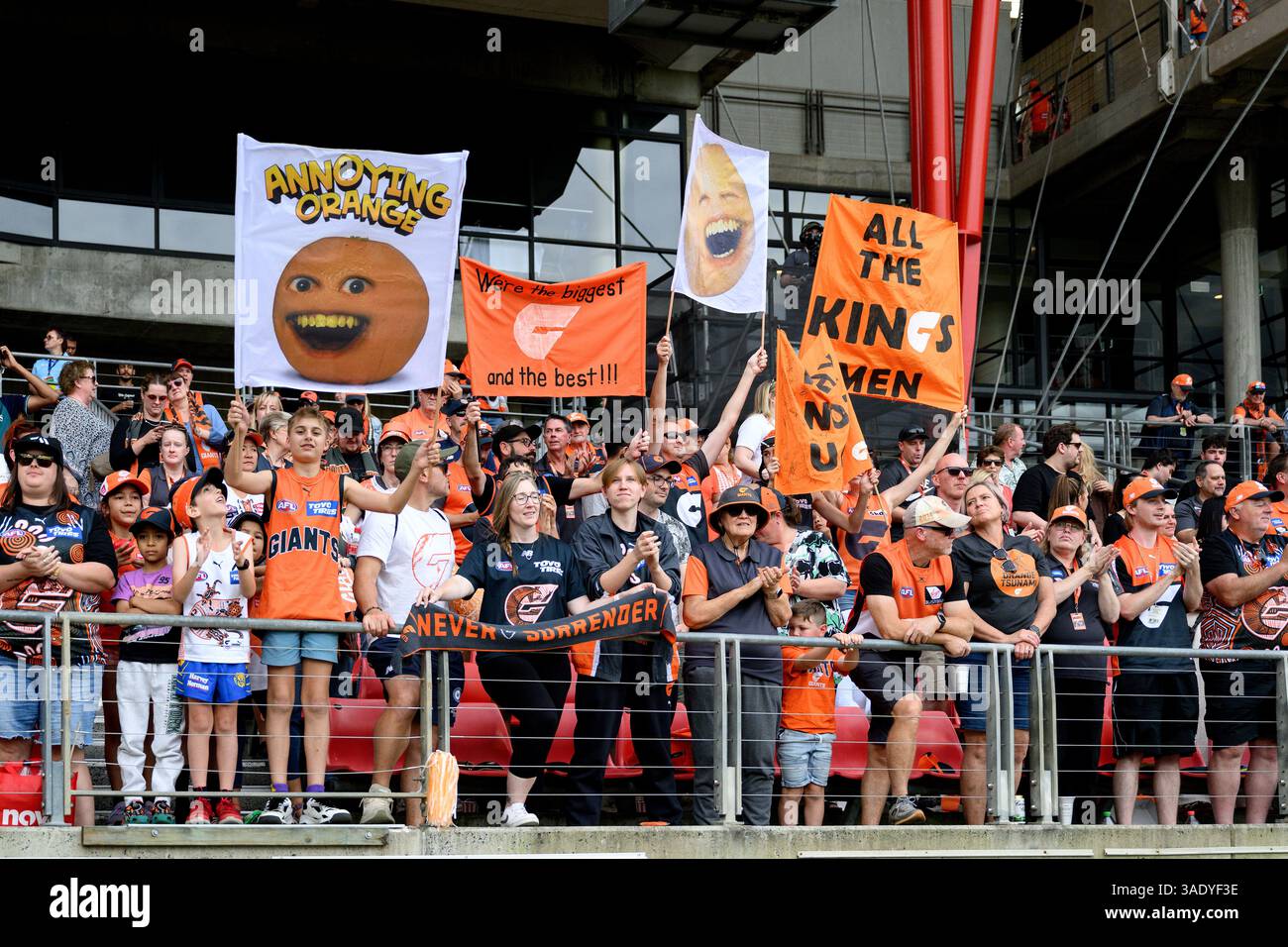 Giants supporters cheer during the AFL Round 4 match between the GWS ...