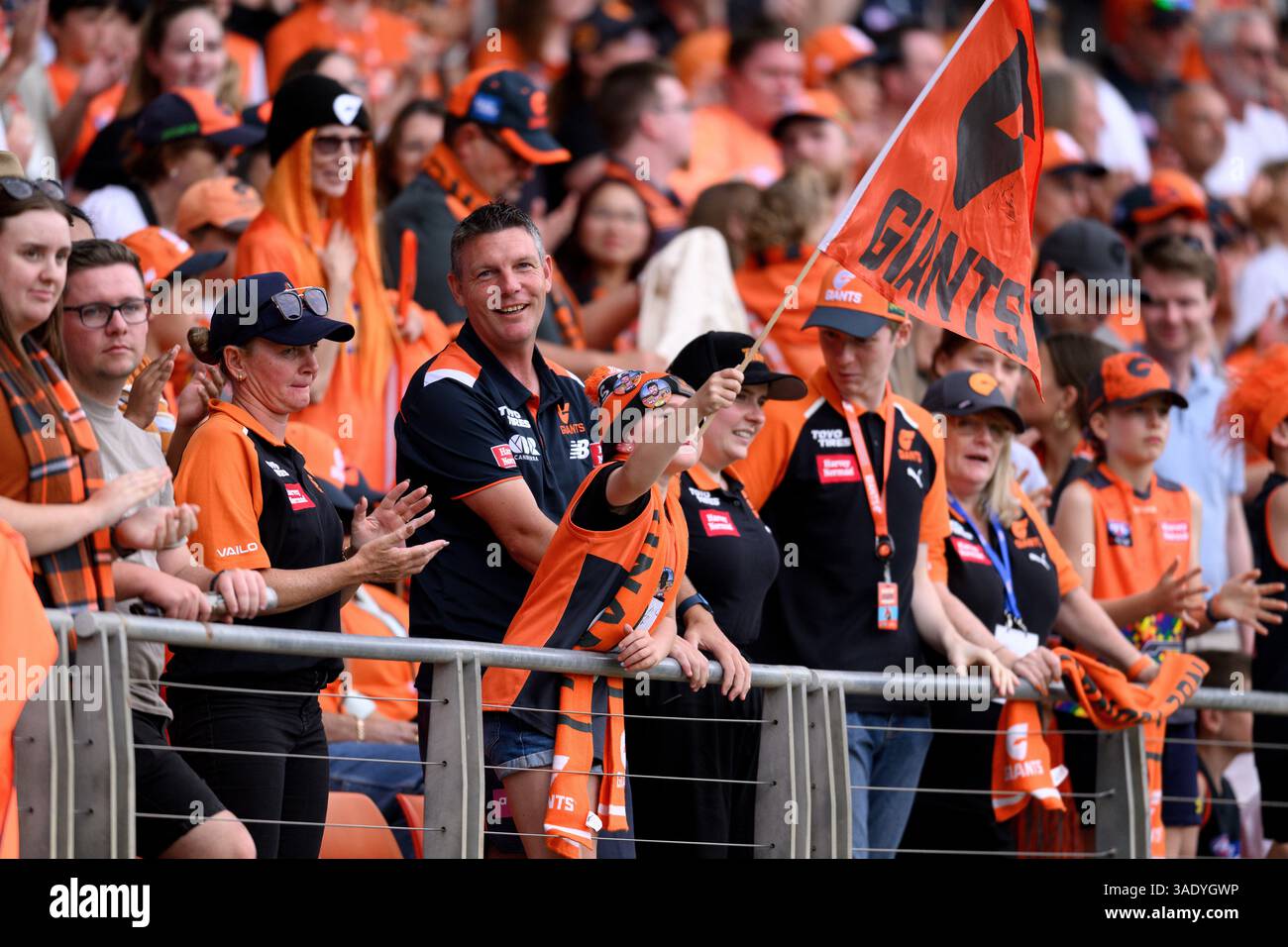 Giants supporters cheer during the AFL Round 4 match between the GWS ...