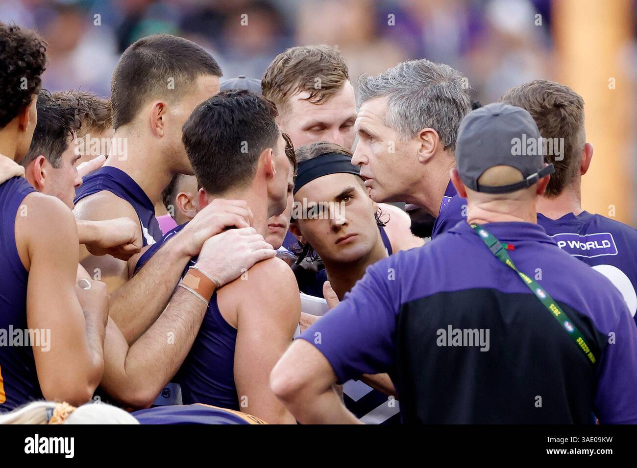 Perth, Australia. 06th Apr, 2025. Justin Longmuir, coach of the Fremantle Dockers talks to his ...
