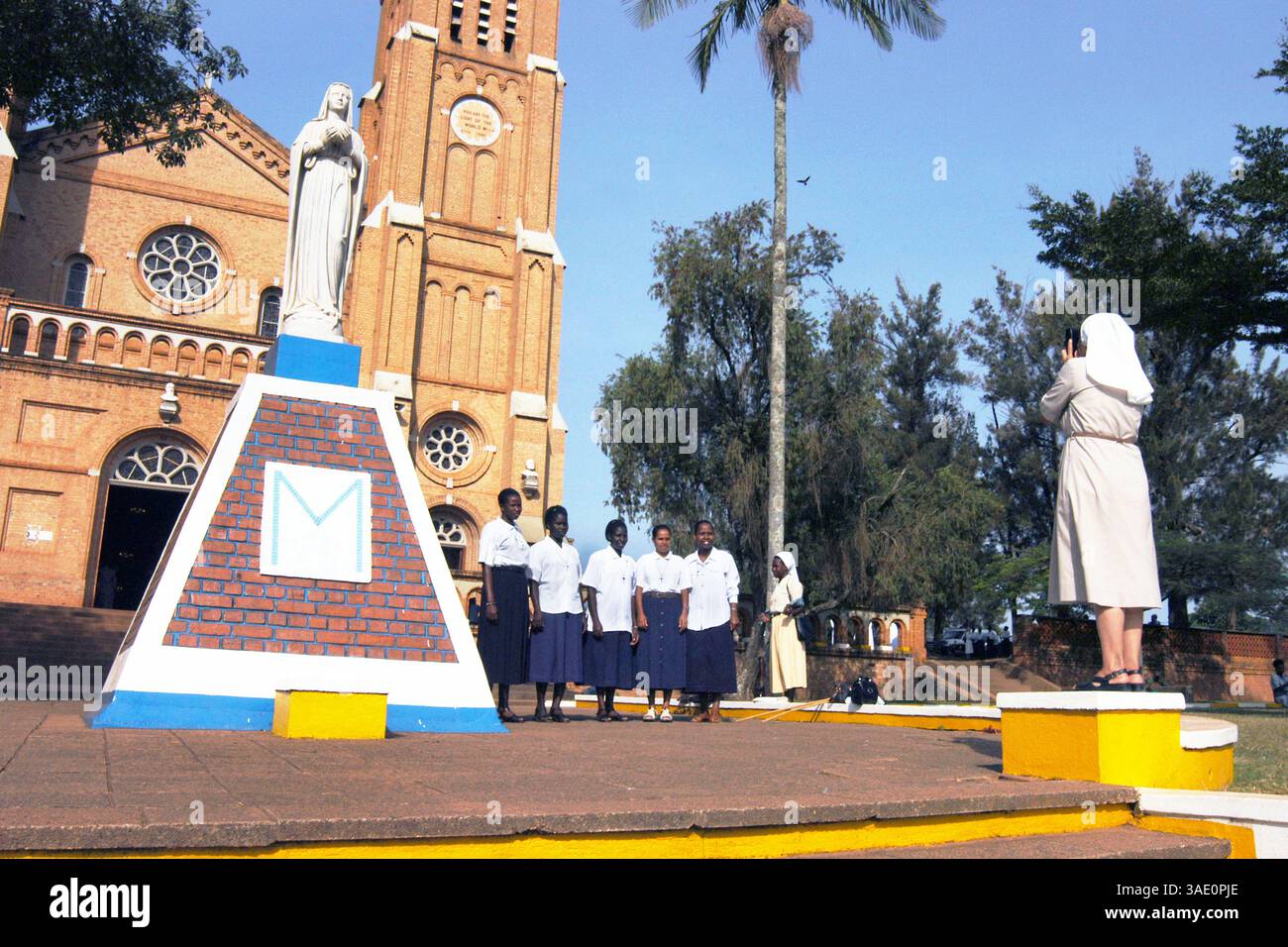Nuns and Priests arrive for prayer while religion attracts the sellers ...