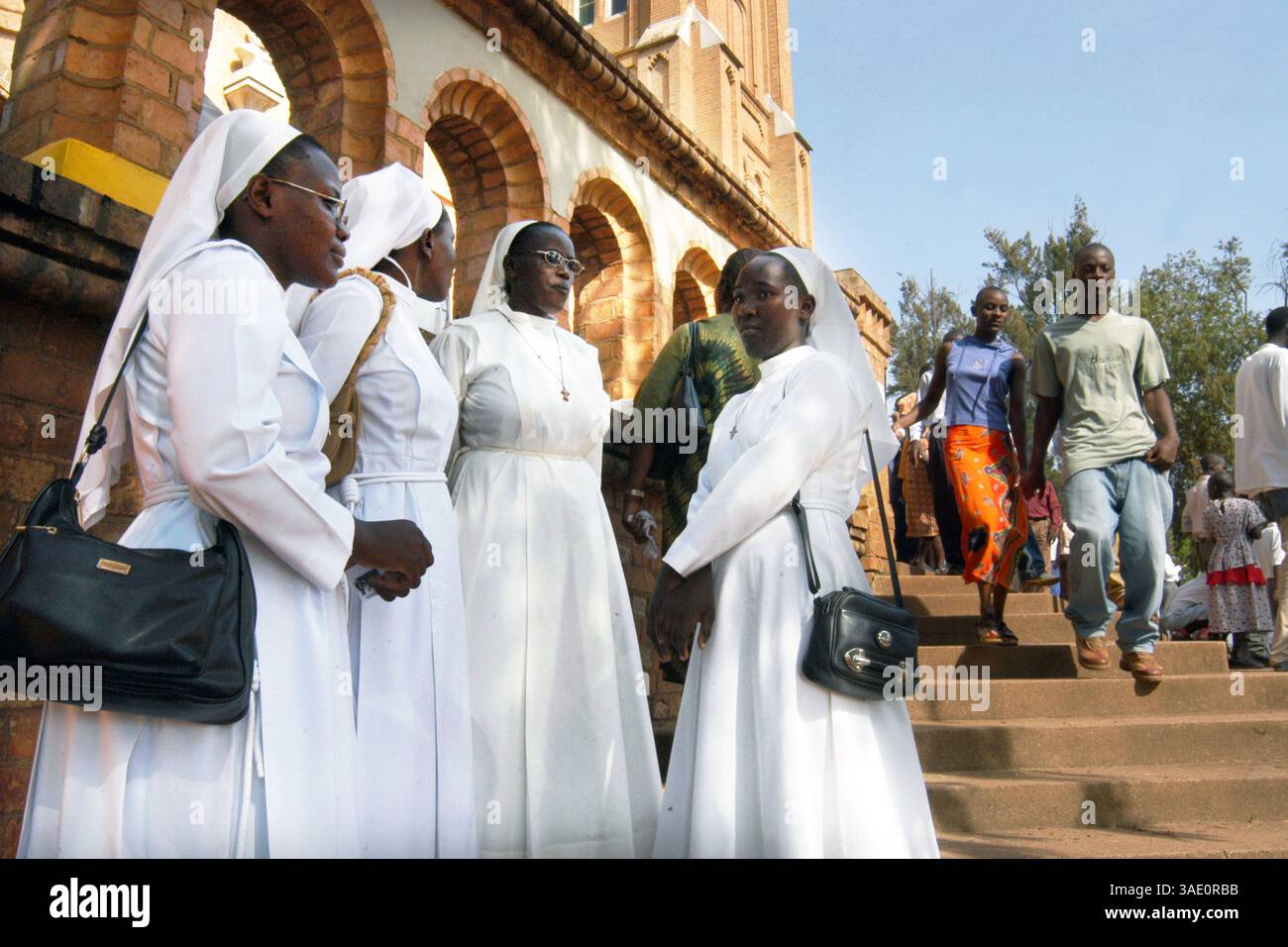 Nuns and Priests arrive for prayer while religion attracts the sellers ...