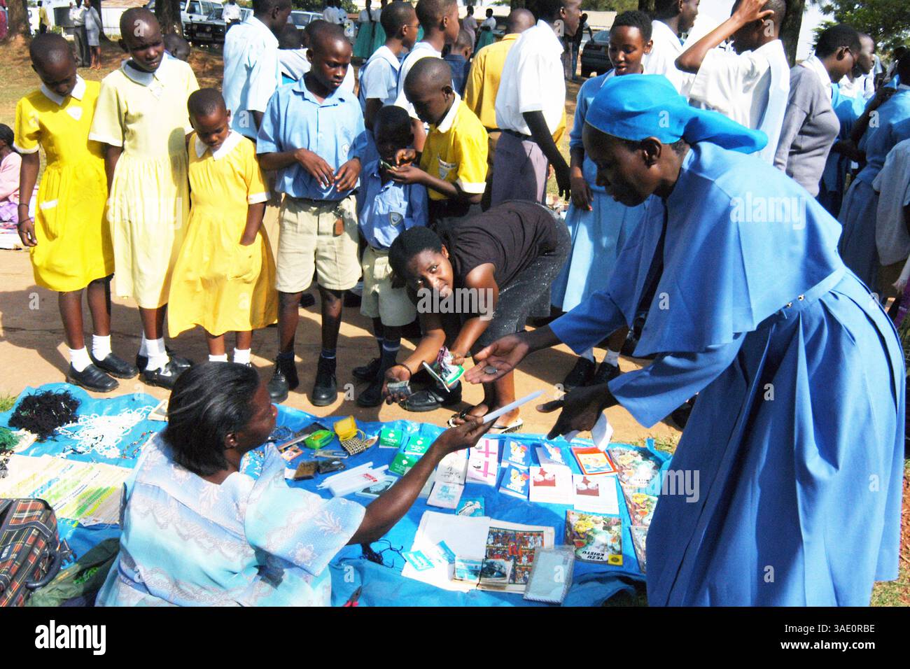 Nuns and Priests arrive for prayer while religion attracts the sellers ...