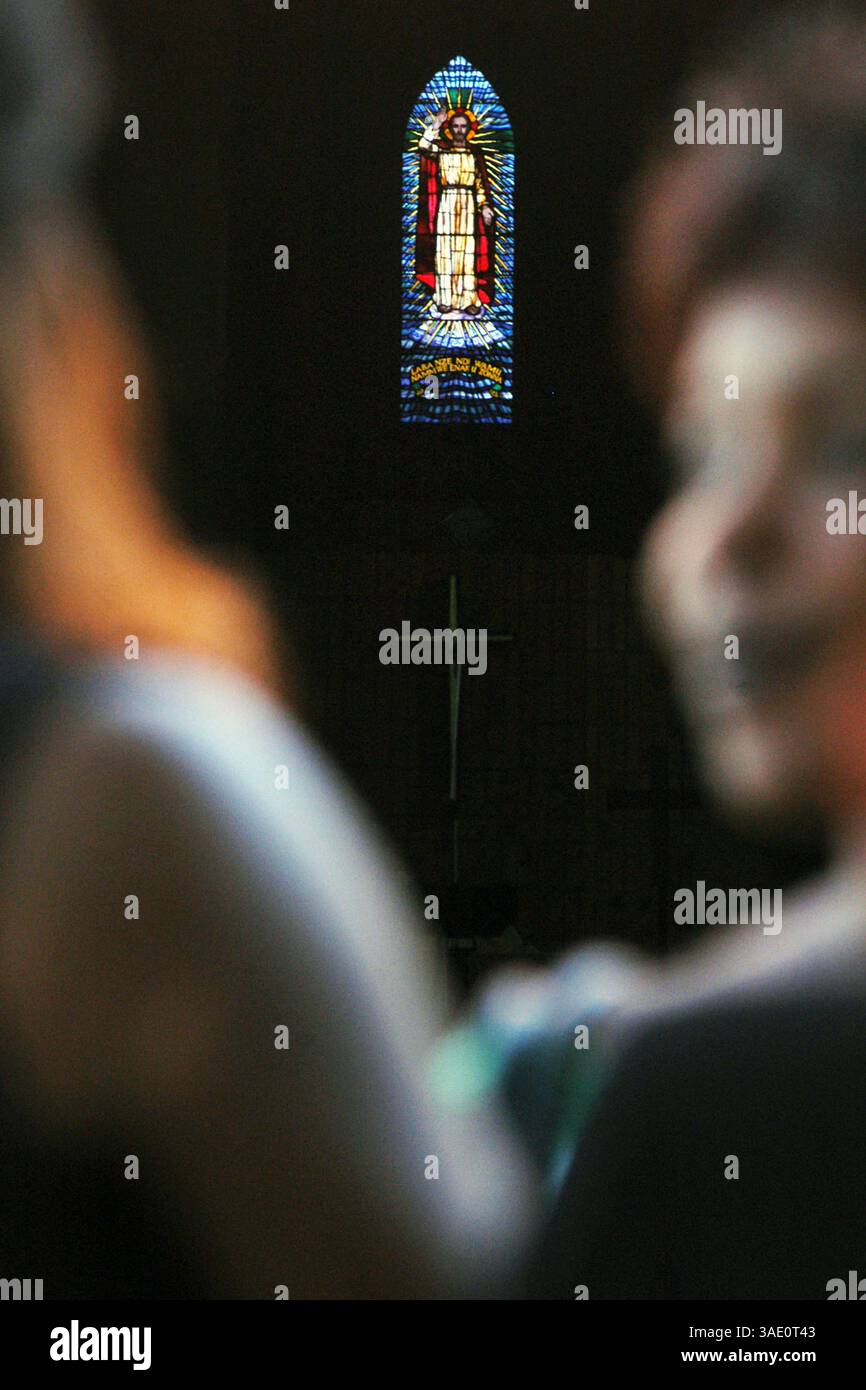 Nuns and Priests arrive for prayer while religion attracts the sellers ...