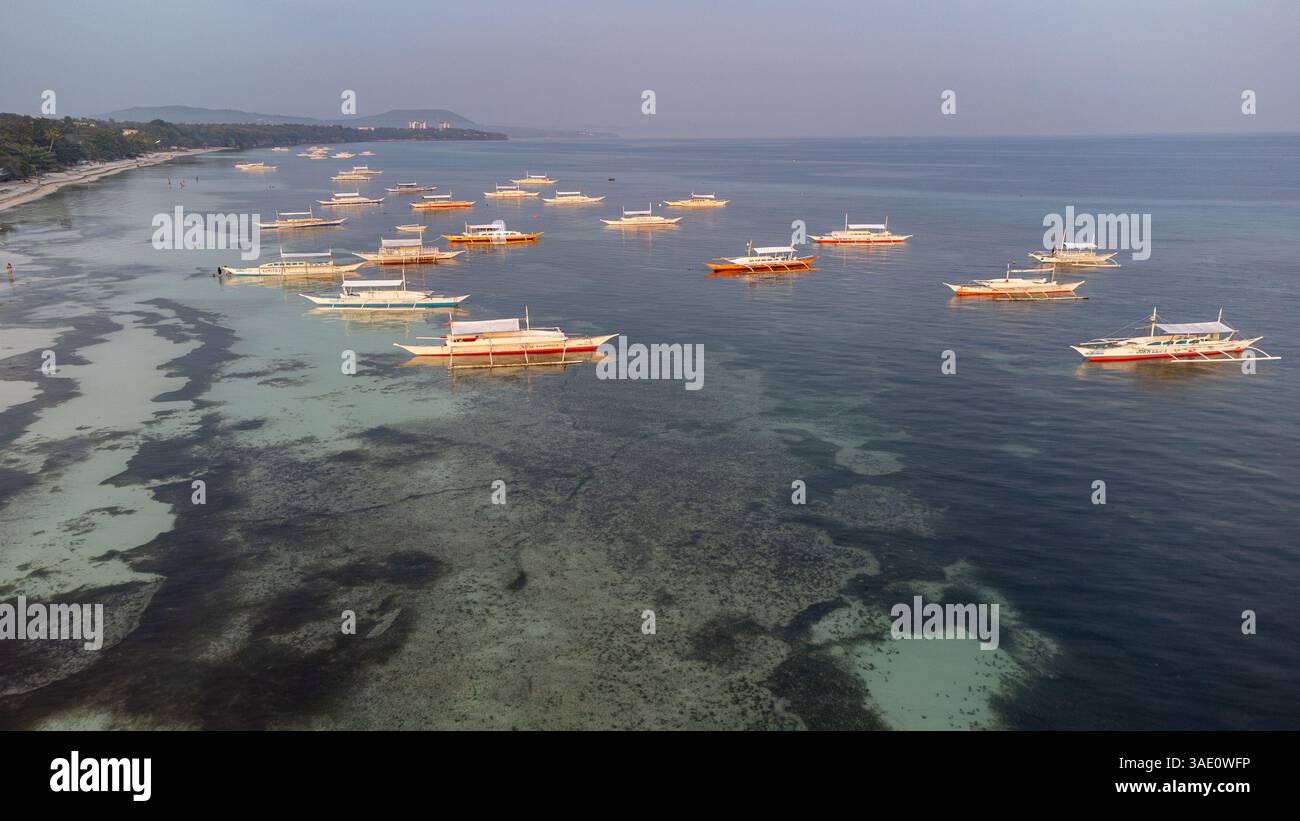 Aerial view of the beach with fishing boats in Bohol, Philippines Stock ...