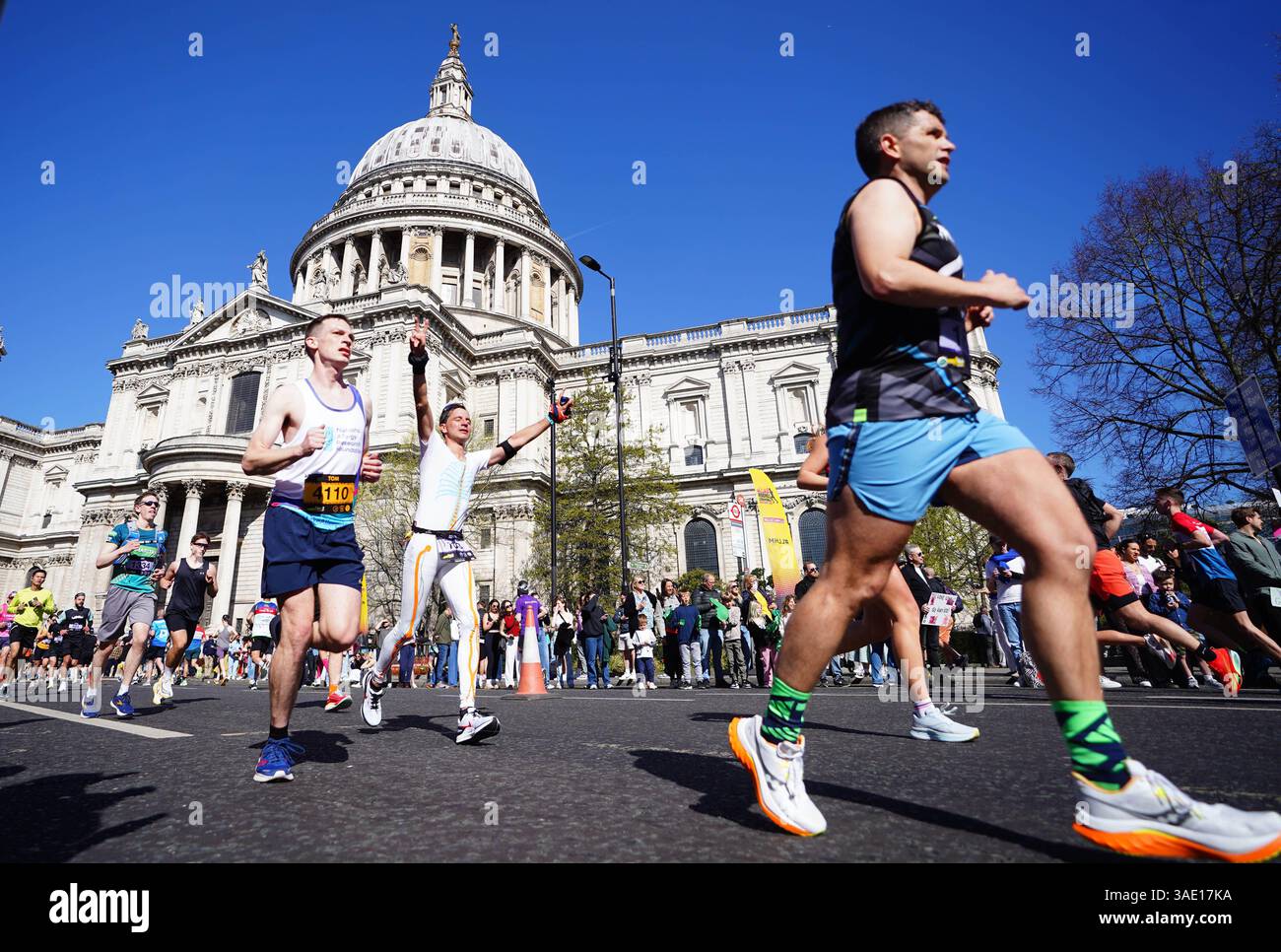 Runners taking part in the London Landmarks Half Marathon run past St ...