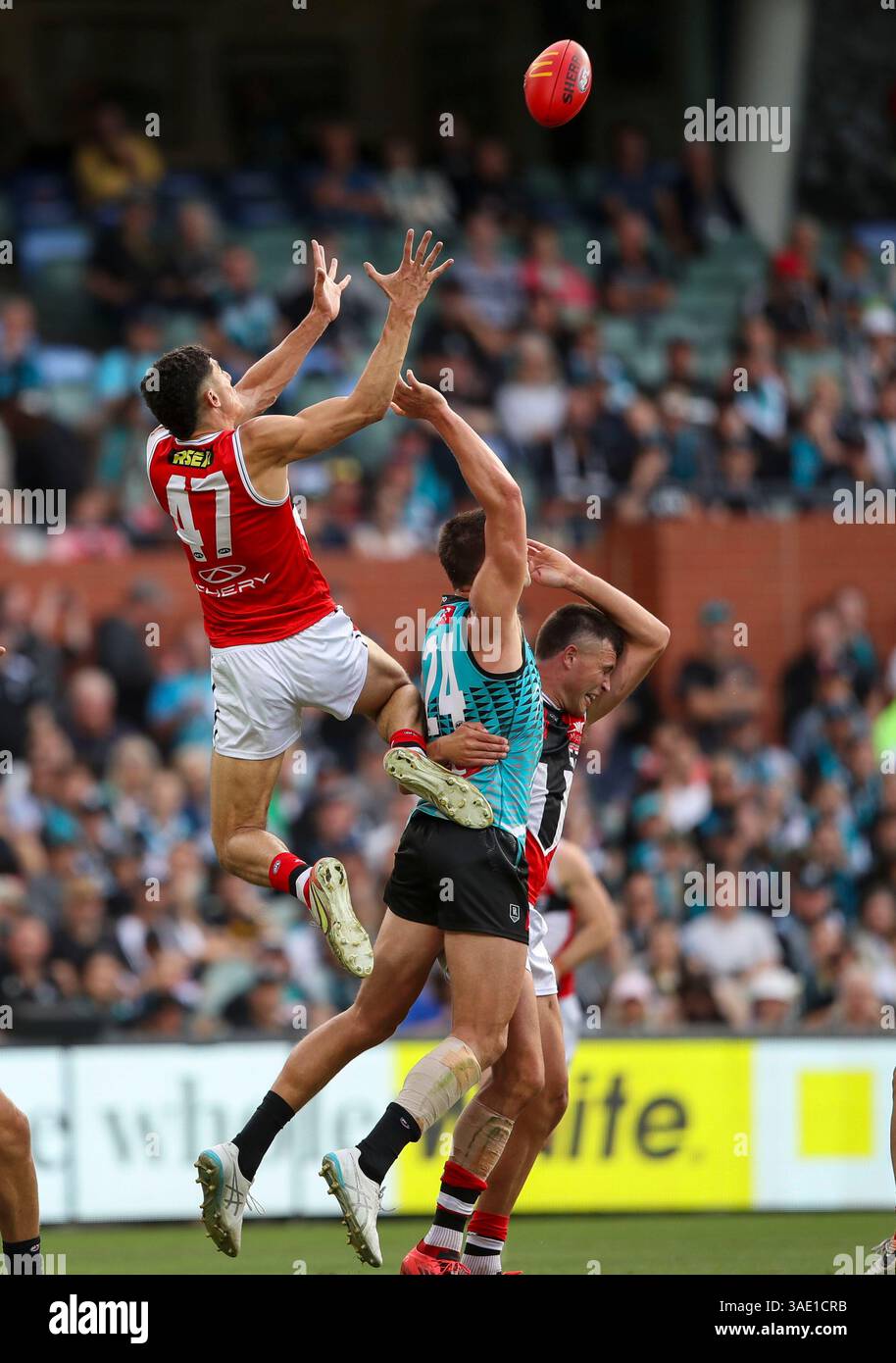 Anthony Caminiti of the Saints attempts to mark the ball over Jordon ...