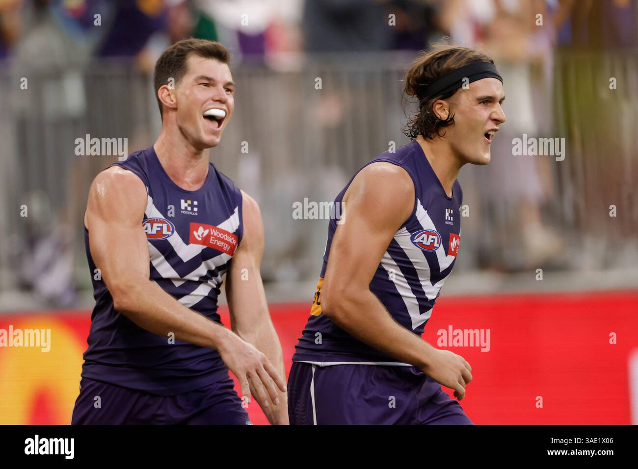 Murphy Reid (right) of the Dockers is congratulated by Jaeger O'Meara ...