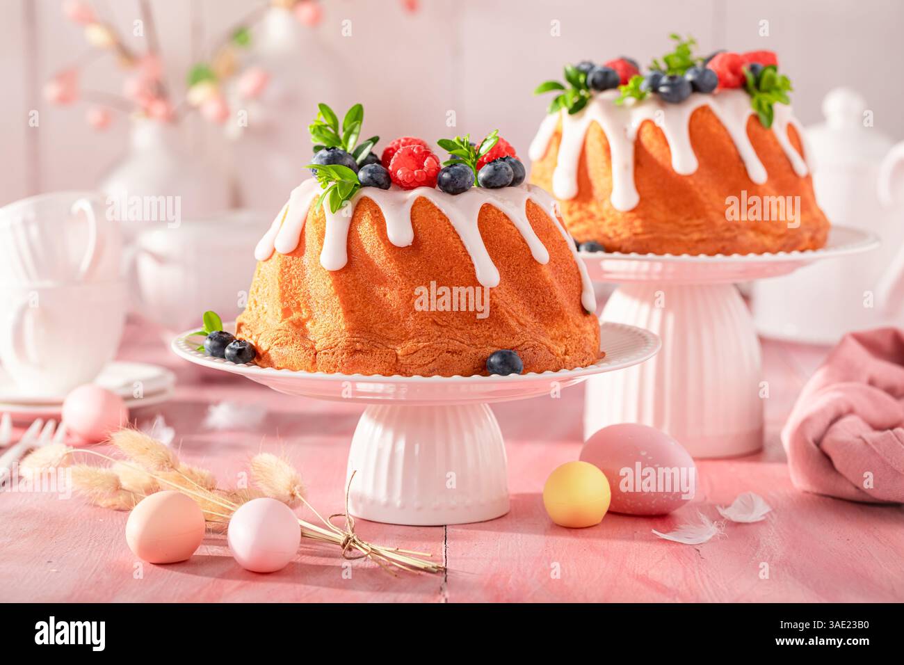 Sweet Easter ring cake with raspberries and blueberries. Easter spring ...