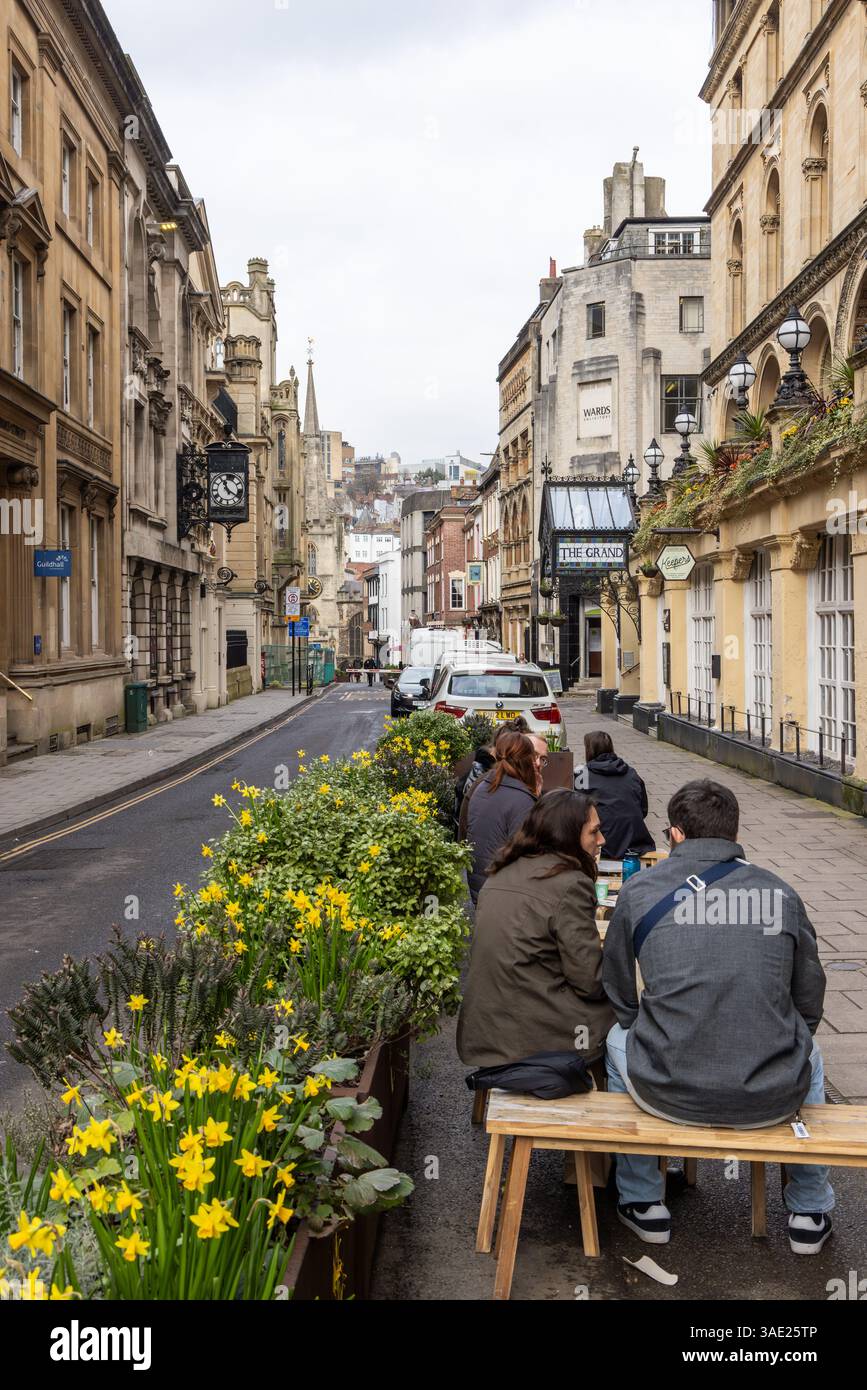 Couples sat outside in Broad Street Bristol, England, UK Stock Photo ...