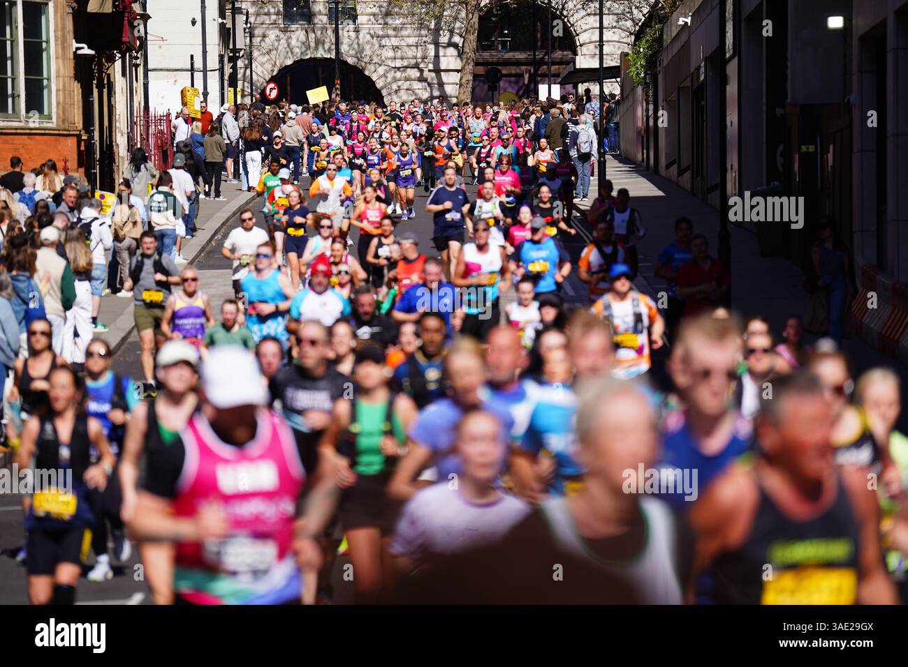 Runners taking part in the London Landmarks Half Marathon run near ...