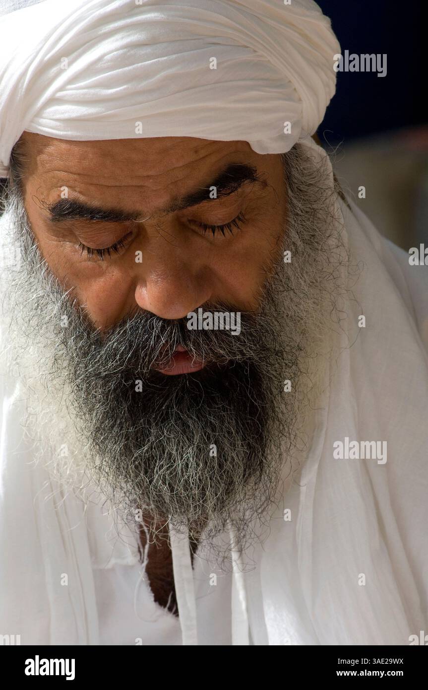 Priest performs baptism ceremony hi-res stock photography and images ...