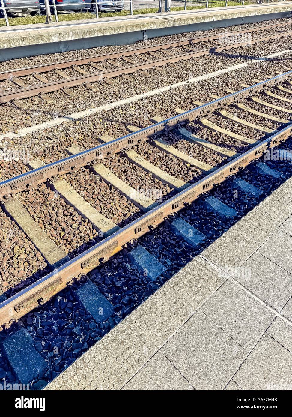 Empty Train Tracks at Station, Gravel and Concrete, Public ...