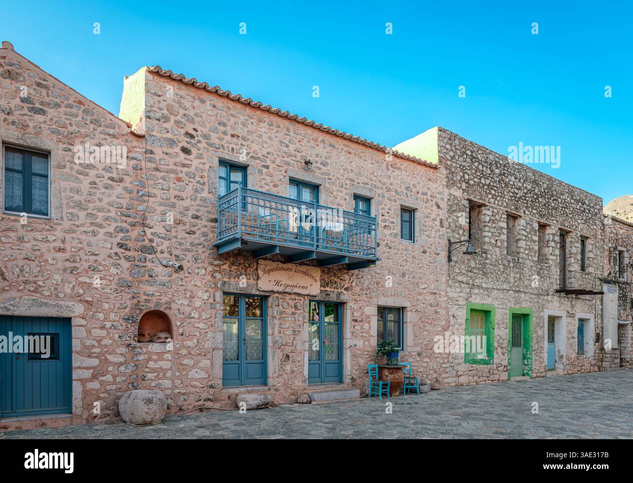 Traditional stone houses in the old town of Areopolis, in East Mani ...