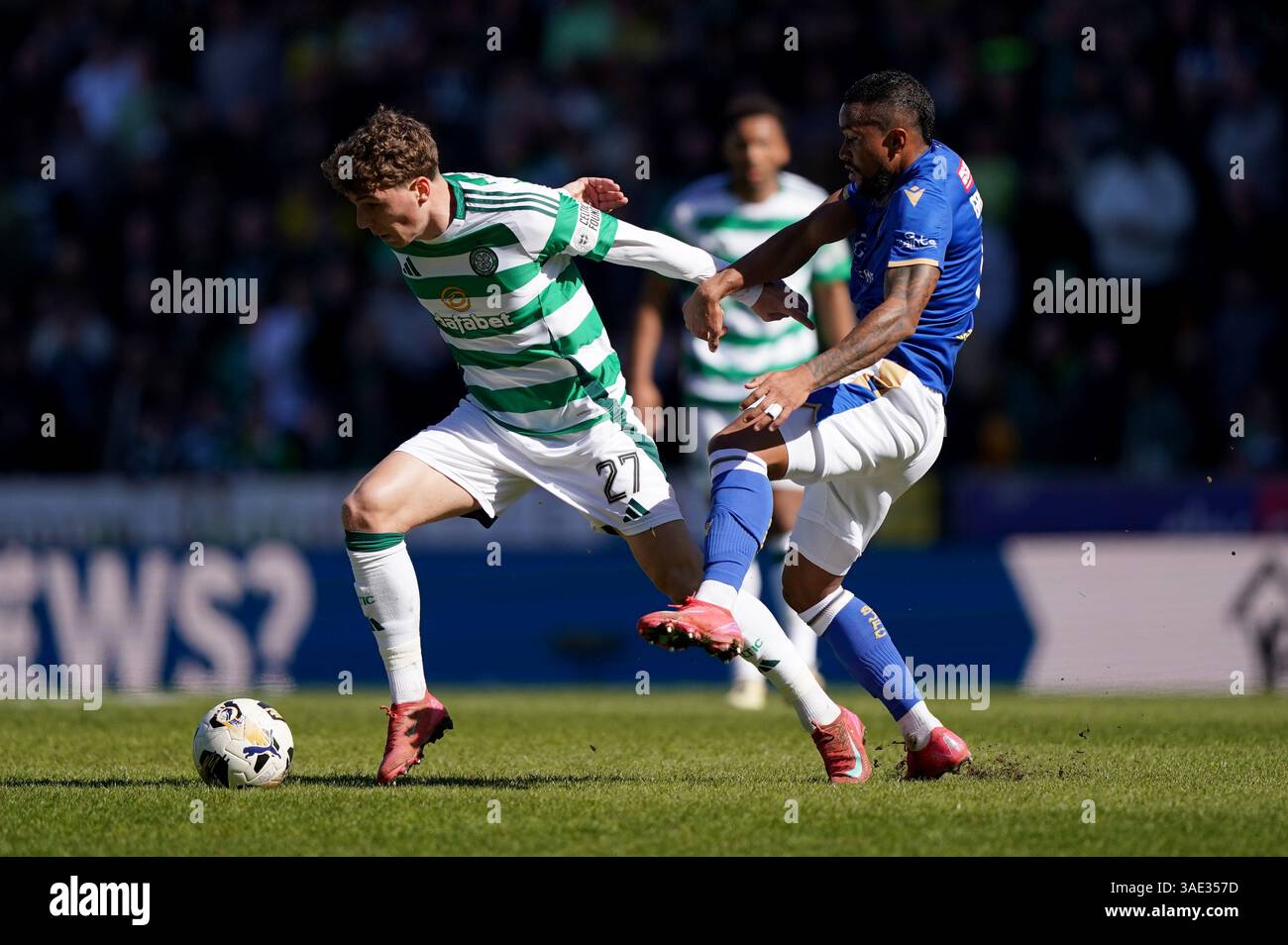 Celtic's Arne Engels (left) and St Johnstone's Victor Griffith battle ...