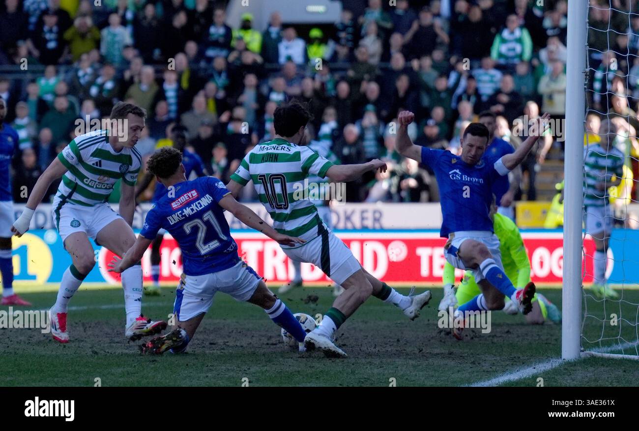 St Johnstone's Stephen Duke-Mckenna (second left) clears the ball from ...
