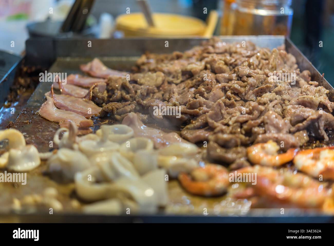 Grilled raw meat beef and pork (barbeque, bbq) a food cooking on wagyu ...