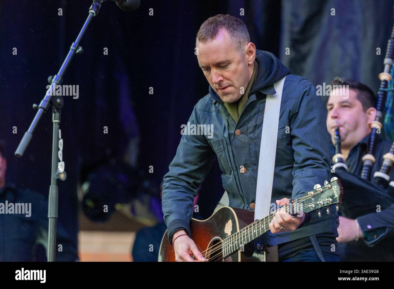 Dropkick Murphys performing on stage at the Hands Off! Rally, organized ...