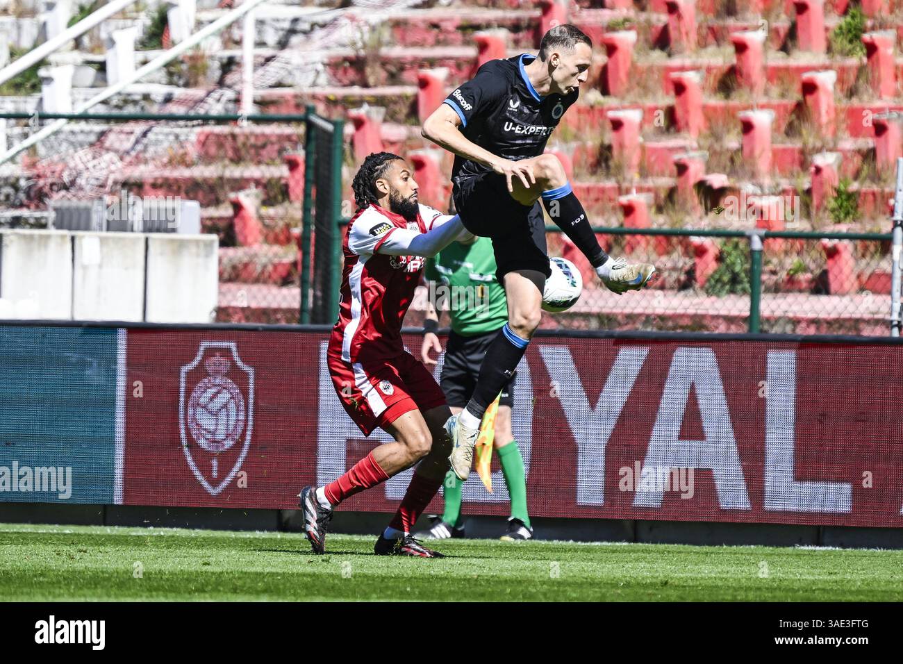 Antwerpen, Belgium. 06th Apr, 2025. Antwerp's Jairo Riedewald and Club's Gustaf Nilsson pictured ...