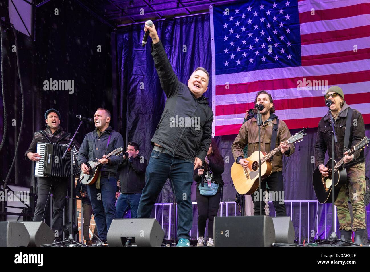 Dropkick Murphys performing on stage at the Hands Off! Rally, organized ...
