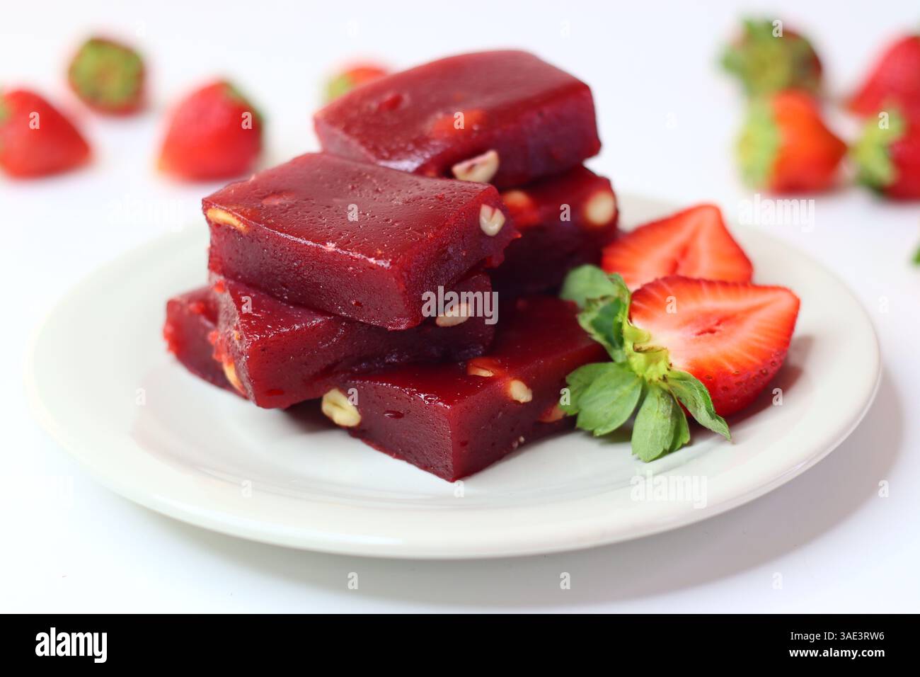 Strawberry halwa, a smooth Indian dessert with a rich pink hue. Served ...