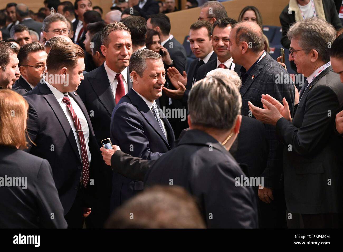 Republican People's Party or (CHP) leader Ozgur Ozel, center, greets ...