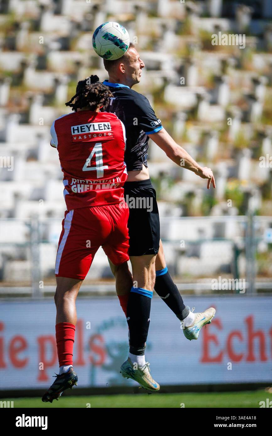 Antwerpen, Belgium. 06th Apr, 2025. Antwerp's Jairo Riedewald and Club's Gustaf Nilsson fight ...