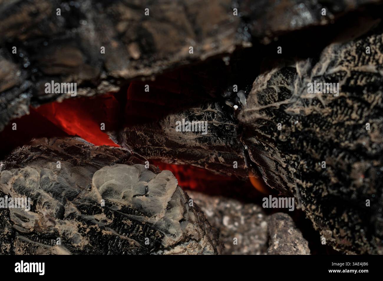 Textured background with burnt wooden blocks Stock Photo - Alamy