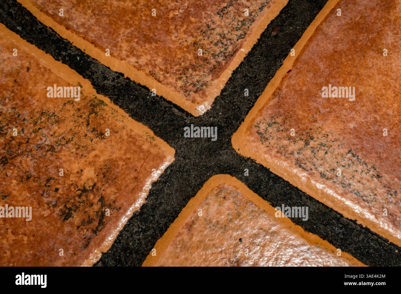 Orange floor tiles with lines Stock Photo - Alamy