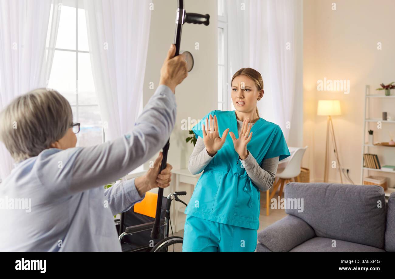 Angry Senior Patient Threatening Doctor Or Nurse With Cane Stock Photo ...