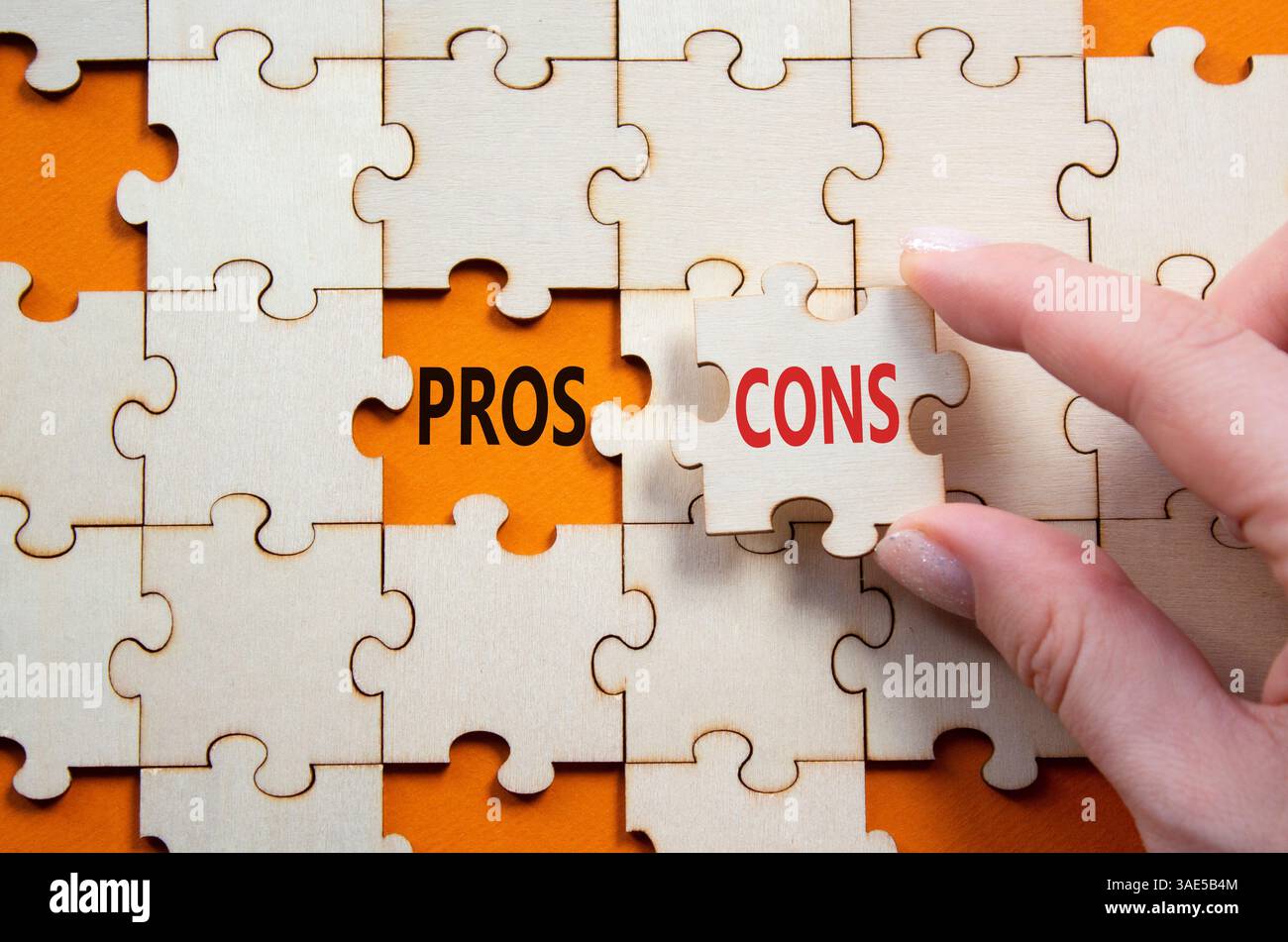 Pros vs Cons symbol. Concept word Pros vs Cons on wooden puzzle ...