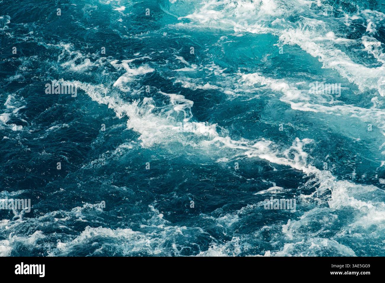 An evocative capture of ocean waves in their natural dance, emphasizing ...