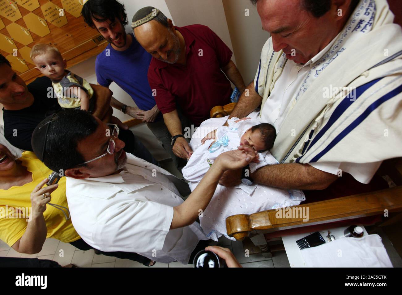 Aug 07, 2009 - Ashdod, Israel - Mohel David Ben Menahem performs a ...