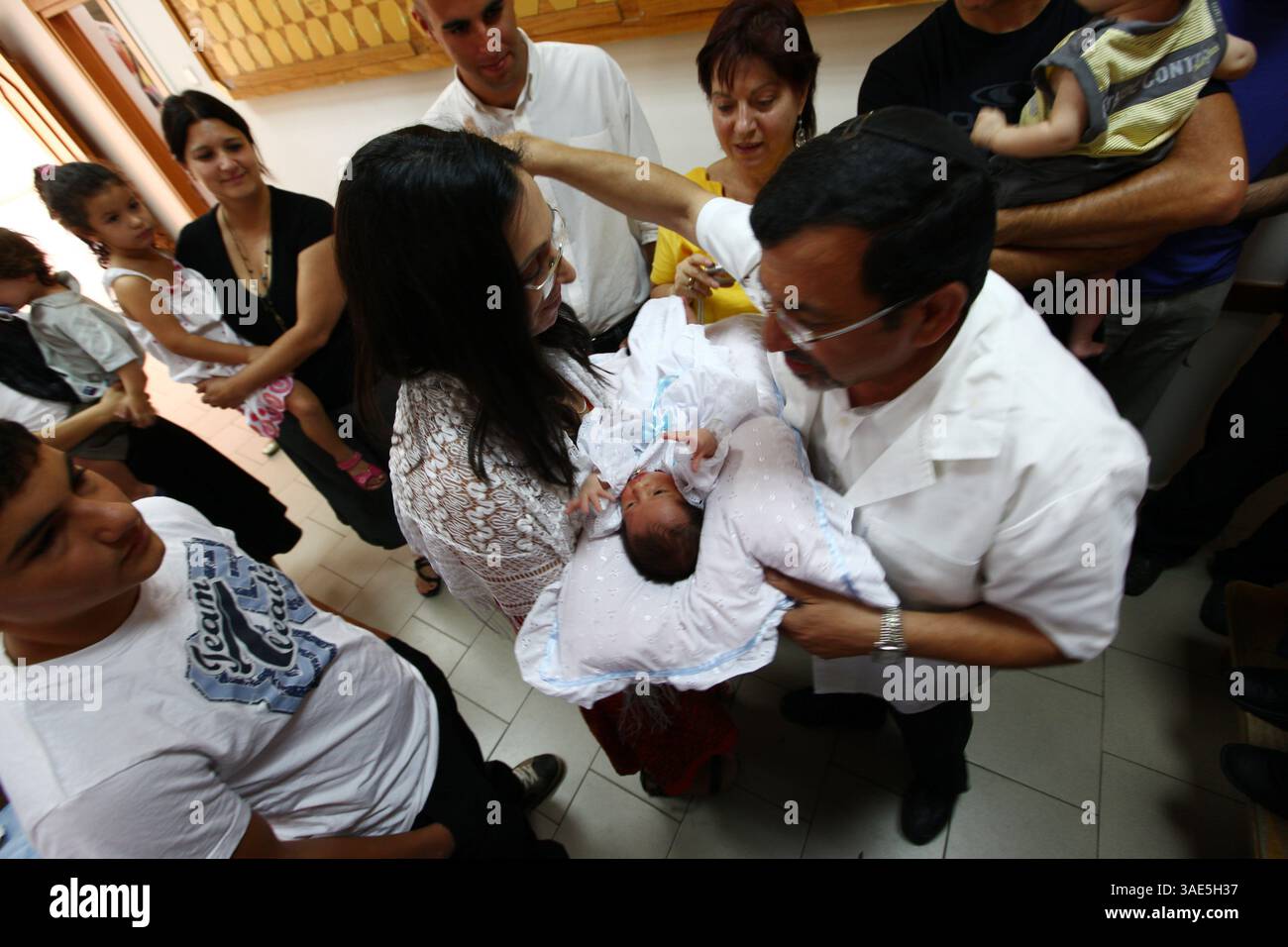 Aug 07, 2009 - Ashdod, Israel - Mohel David Ben Menahem performs a ...