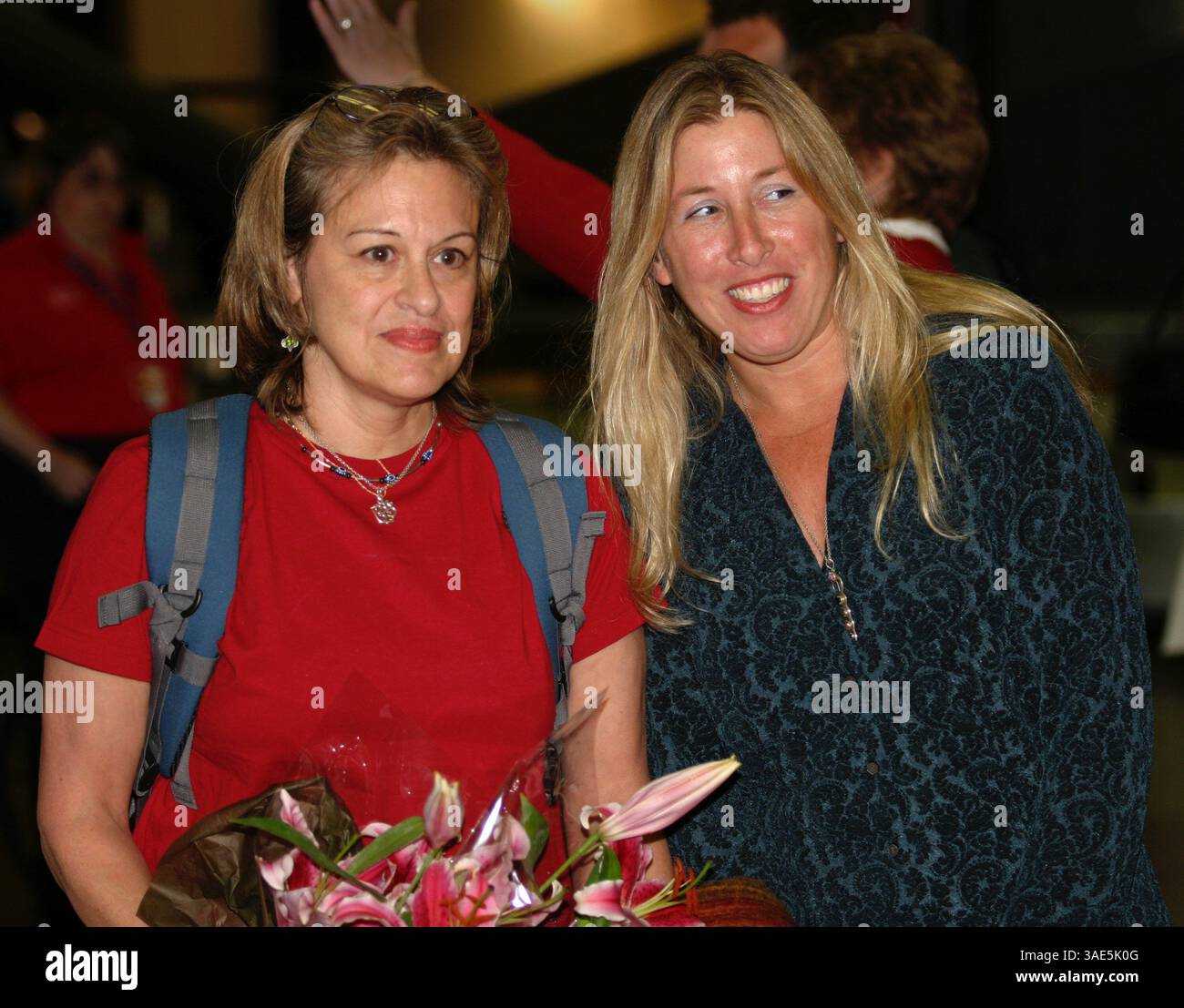 Apr 29, 2004; SeaTac, WA, USA; TAMI SILICIO, left, is greeted by her ...