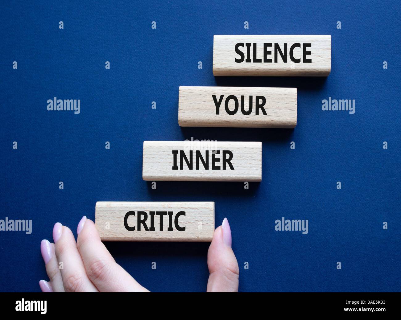 Silence your inner critic symbol. Wooden blocks with words Silence your ...