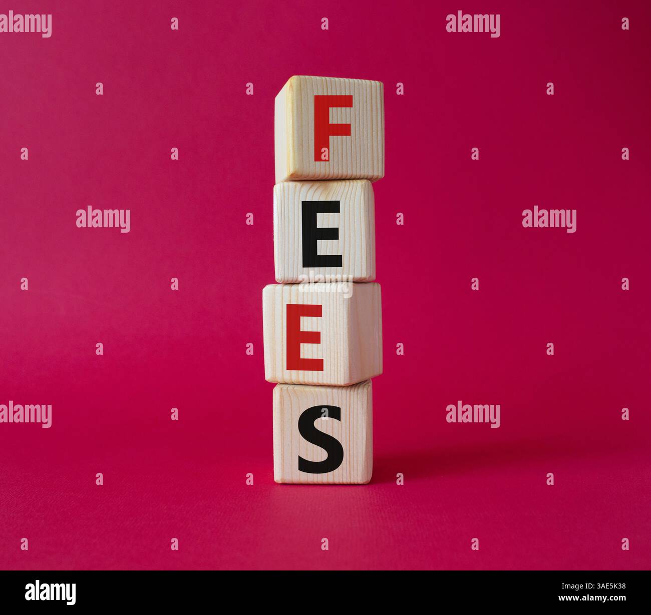Fees symbol. Concept word Fees on wooden cubes. Beautiful red ...