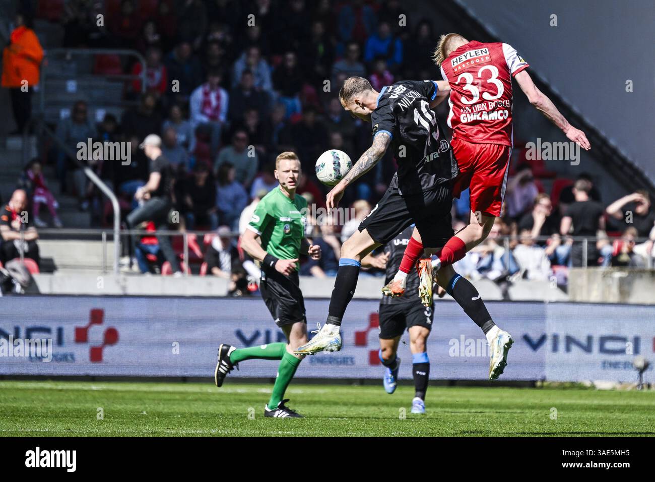 Antwerpen, Belgium. 06th Apr, 2025. Club's Gustaf Nilsson and Antwerp's Zeno Van Den Bosch ...