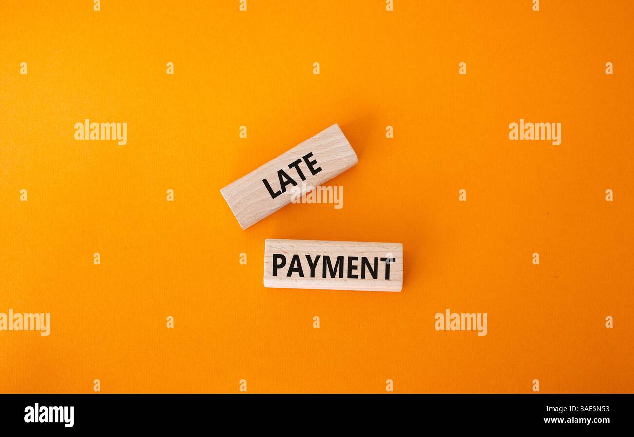 Late payment symbol. Concept word Late payment on wooden blocks ...
