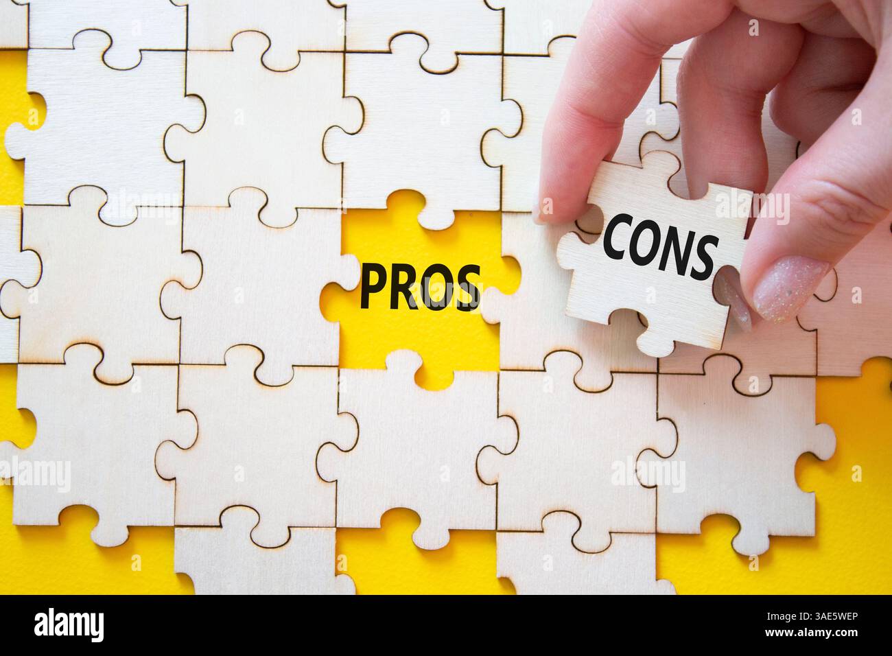 Pros vs Cons symbol. Concept word Pros vs Cons on wooden puzzle ...