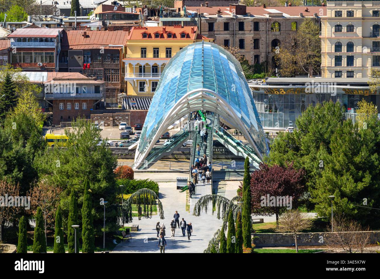Peace bridge, steel and glass construction pedestrian bridge over Kura ...