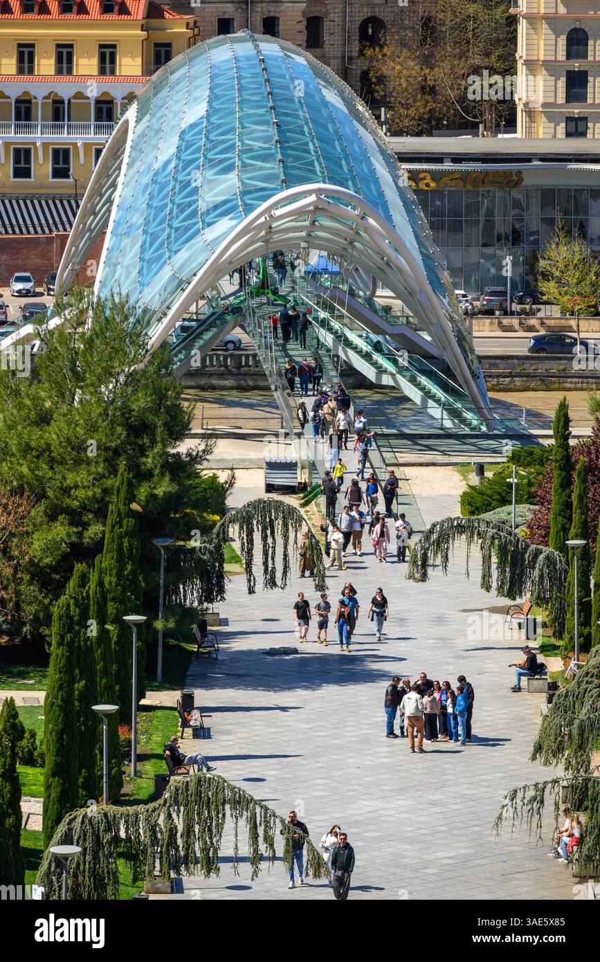 Peace bridge, steel and glass construction pedestrian bridge over Kura ...