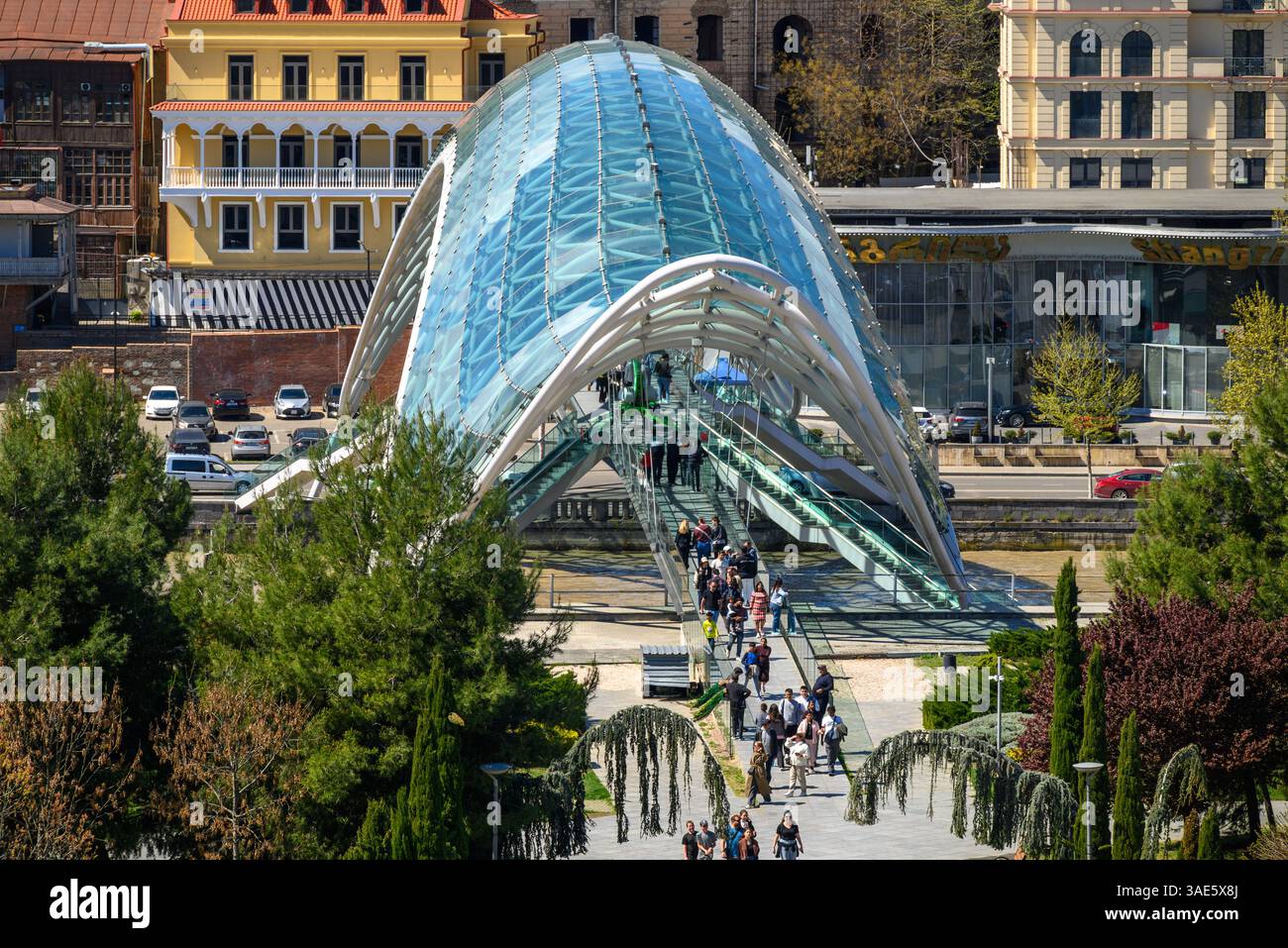 Peace bridge, steel and glass construction pedestrian bridge over Kura ...