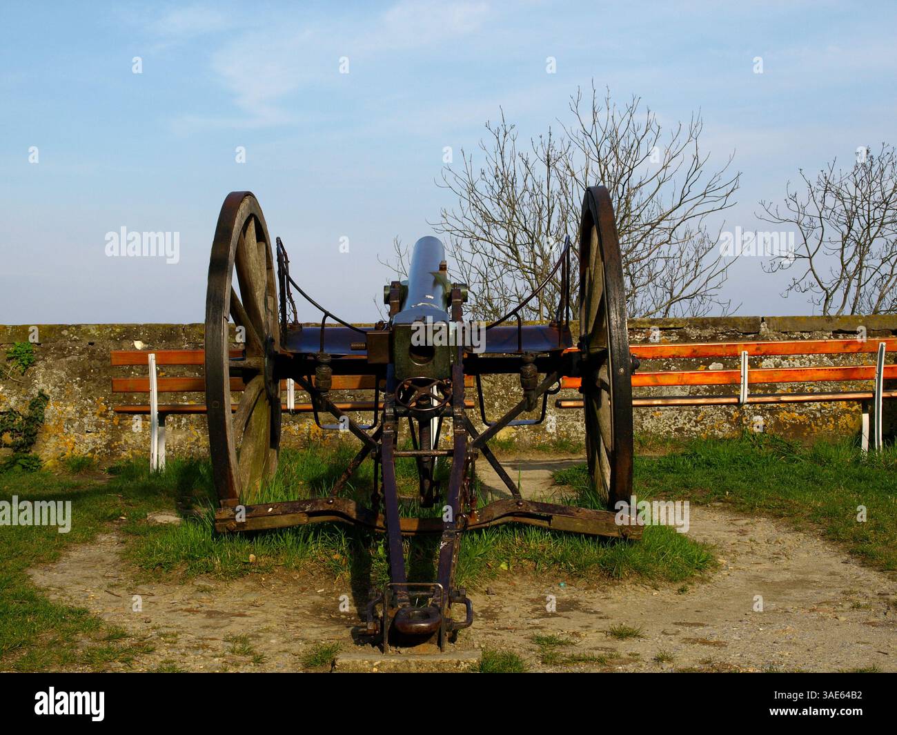 A cannon with its big wheels Stock Photo - Alamy