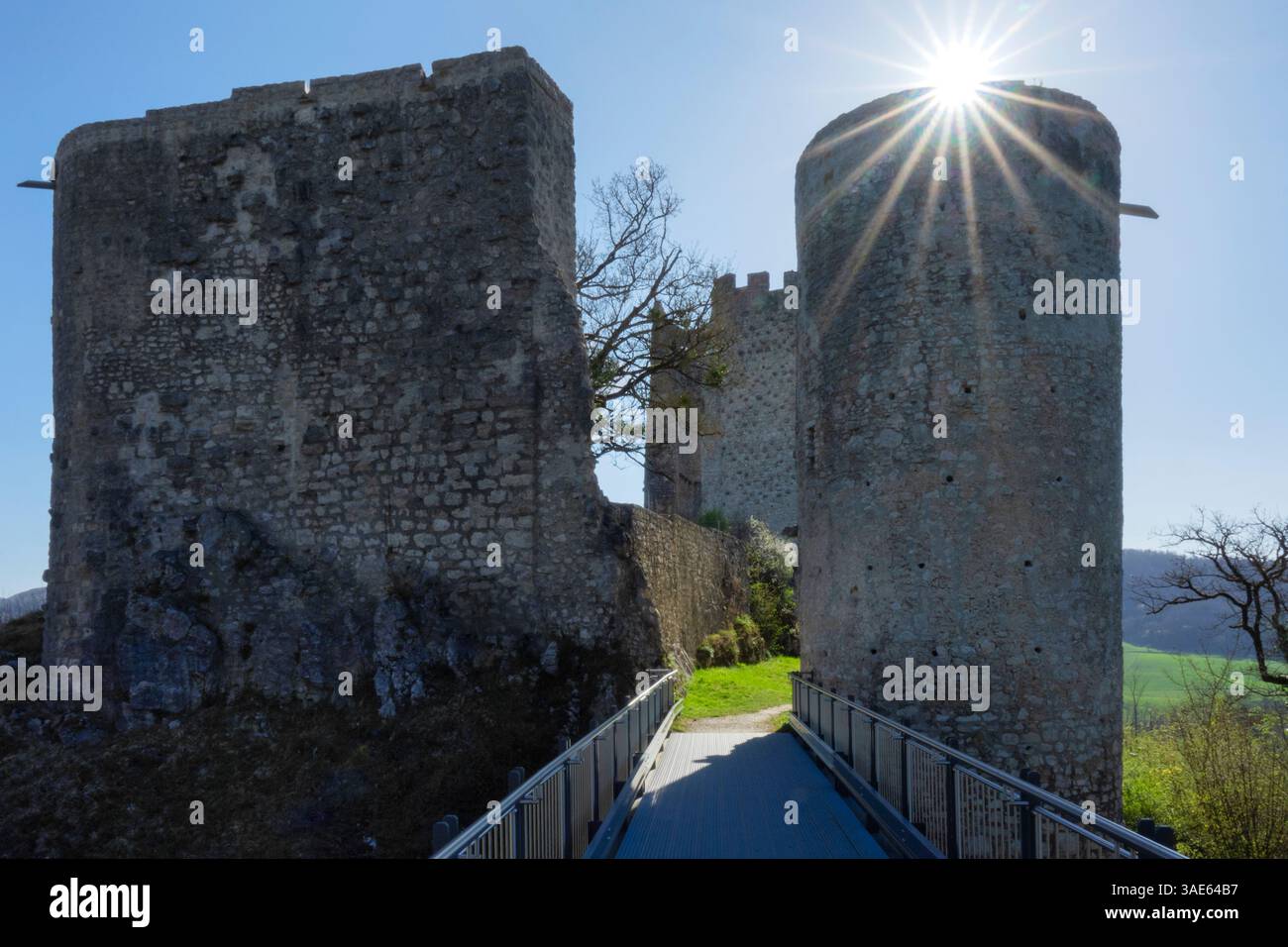 The Pfeffingen castle ruins tower high above the village of the same ...