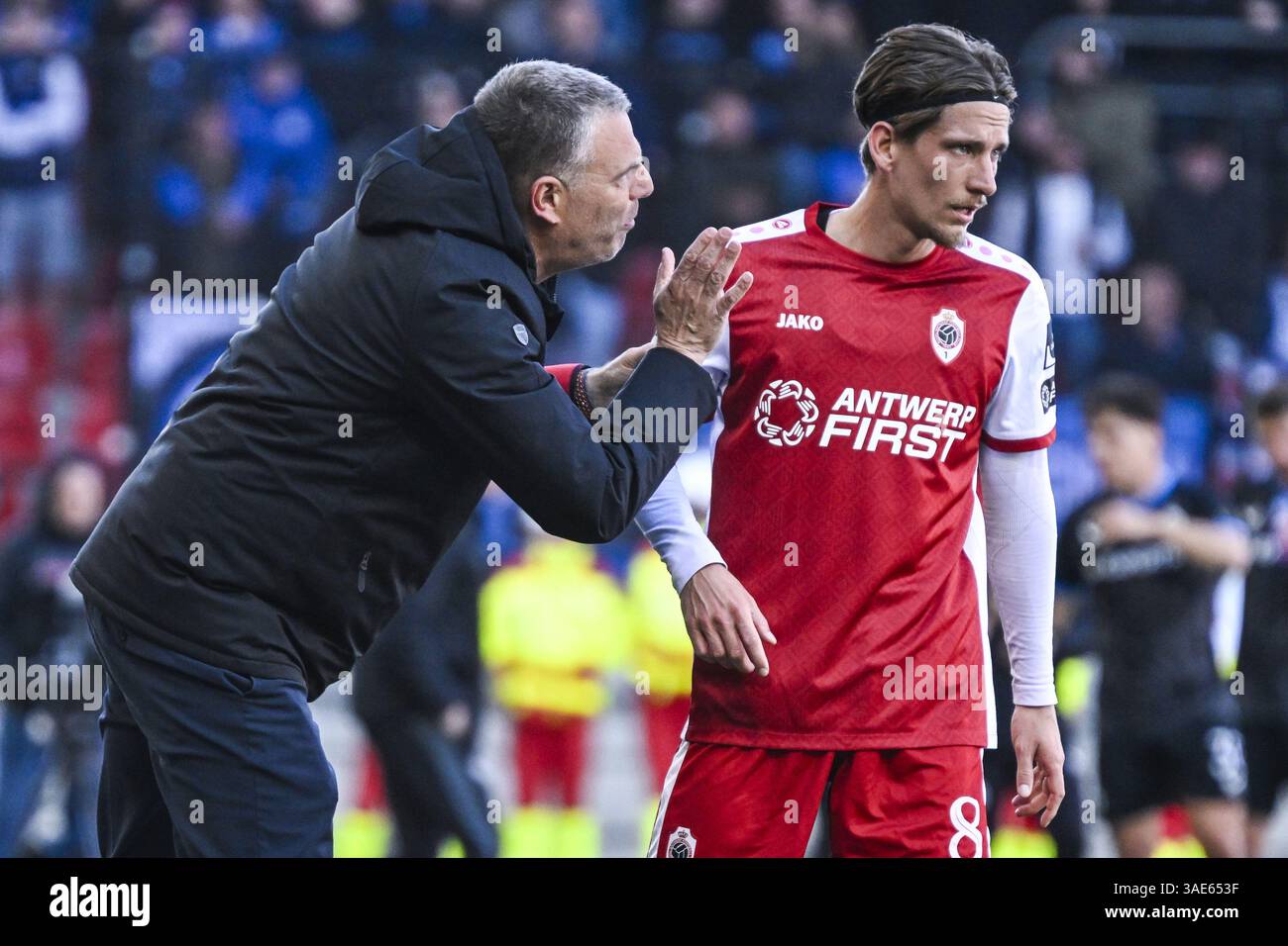 Antwerpen, Belgium. 06th Apr, 2025. Antwerp's head coach Andries Ulderink and Antwerp's Dennis ...