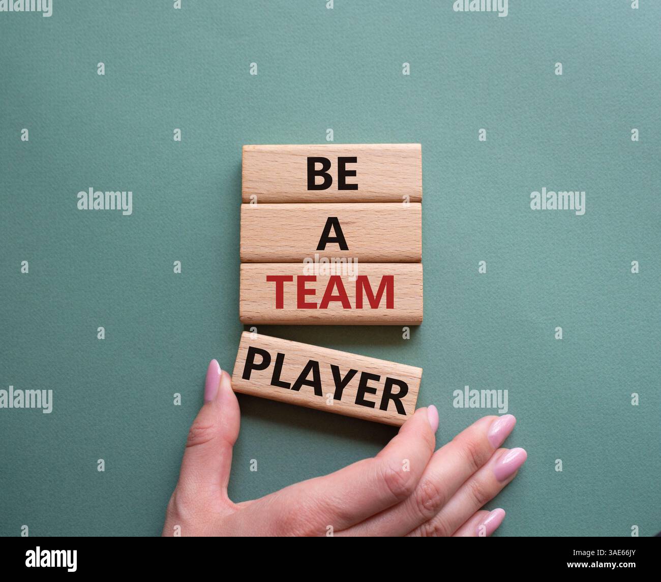 Be a team player symbol. Concept words Be a team player on wooden ...